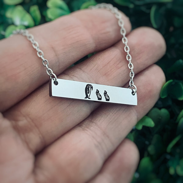 Penguin family necklace store